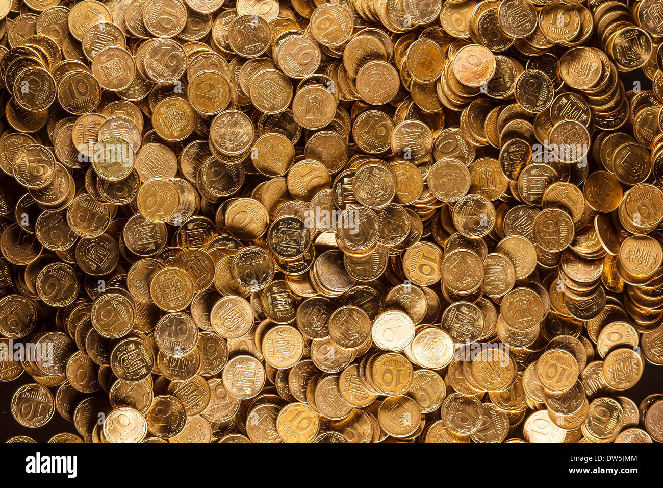 pile of coins Stock Photo - Alamy