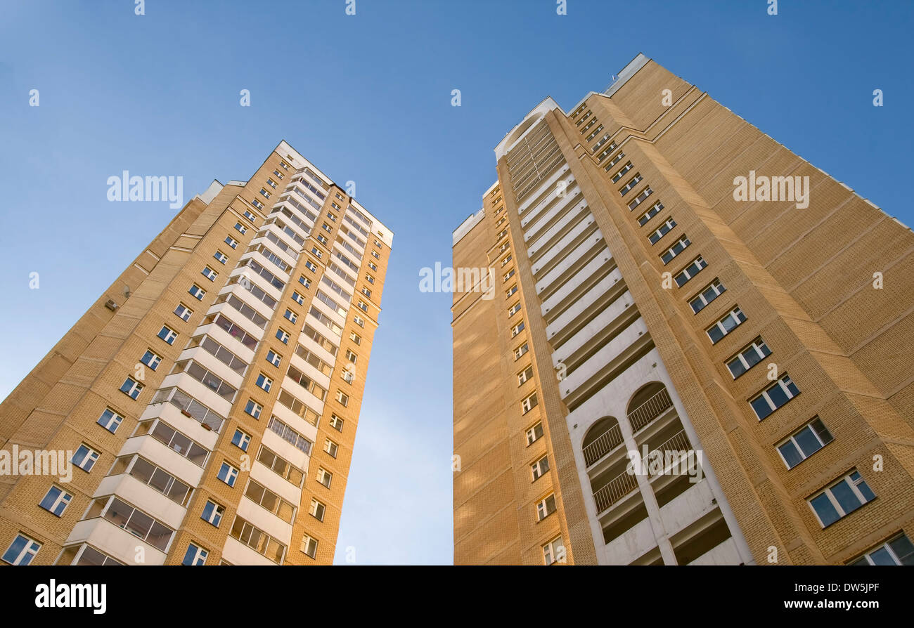 Two residential multistory houses and sky, view from below Stock Photo ...