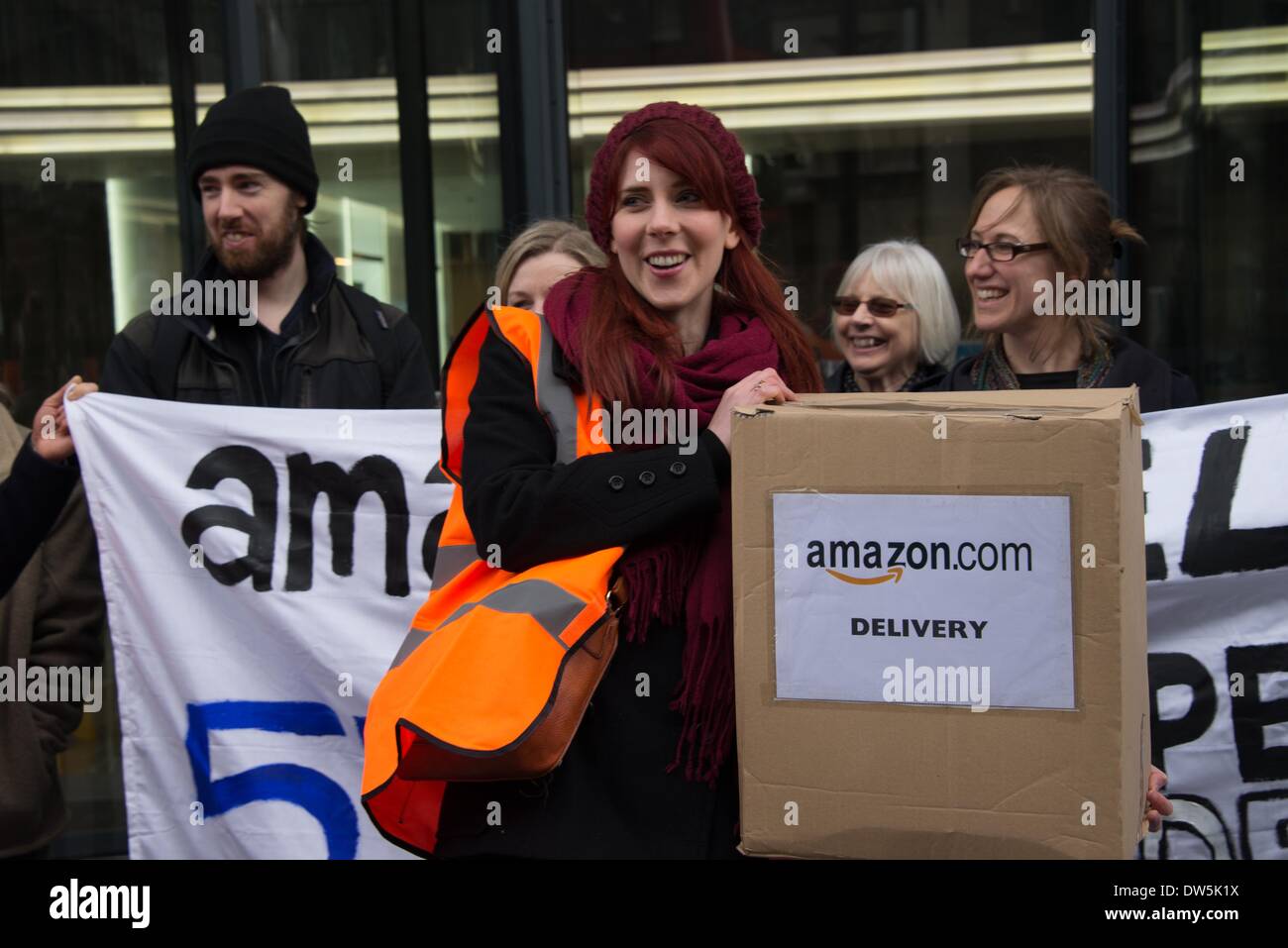 London UK. 28th Feb 2014 : Campaigner,Emily Kenway handed a box of ...