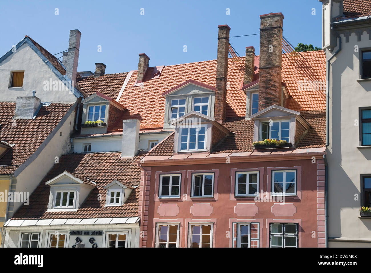 Roofs with chimneys and dormers of an old european town Riga Stock ...