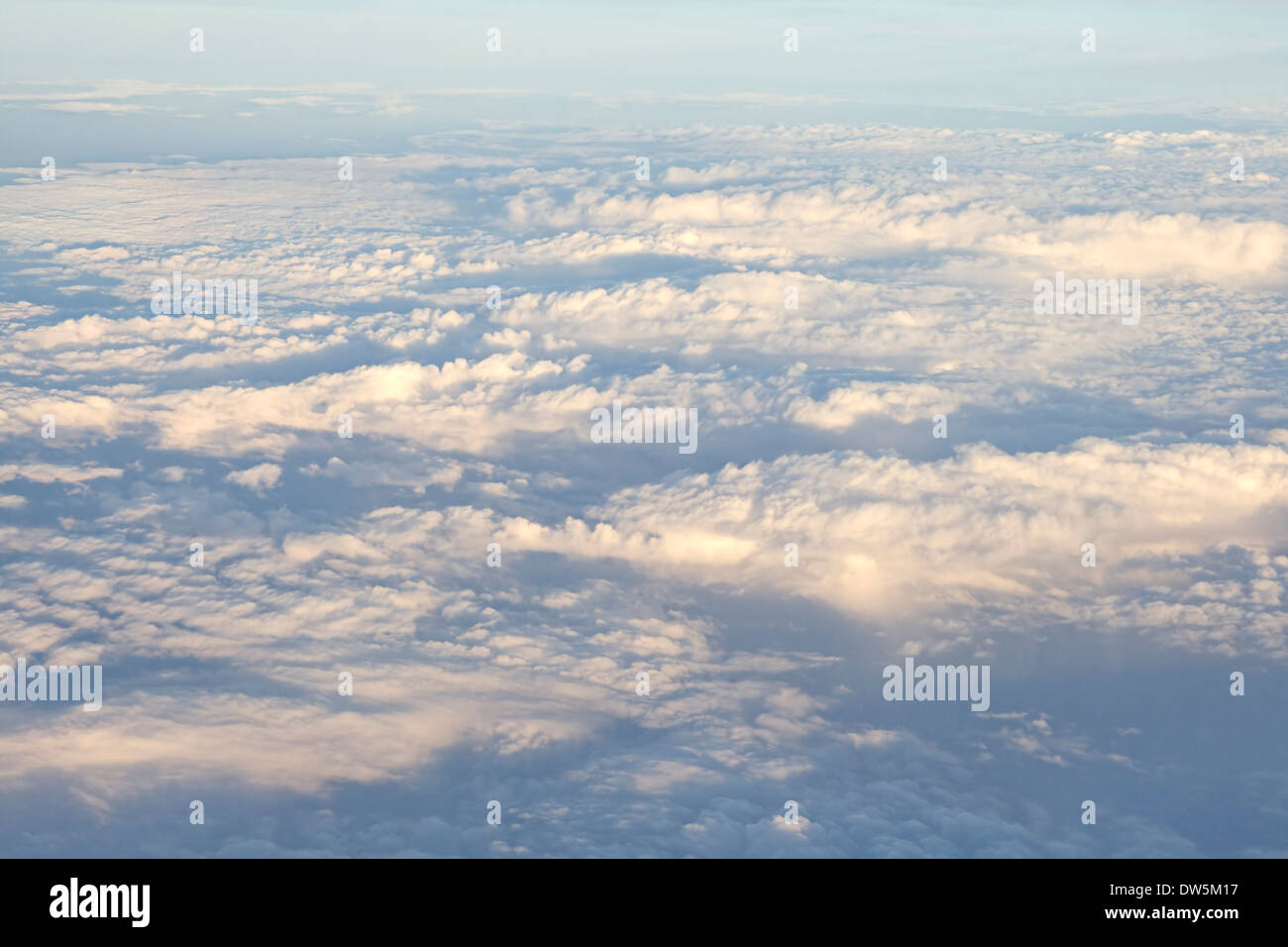 Blue and silver clouds background, view from airplane Stock Photo - Alamy