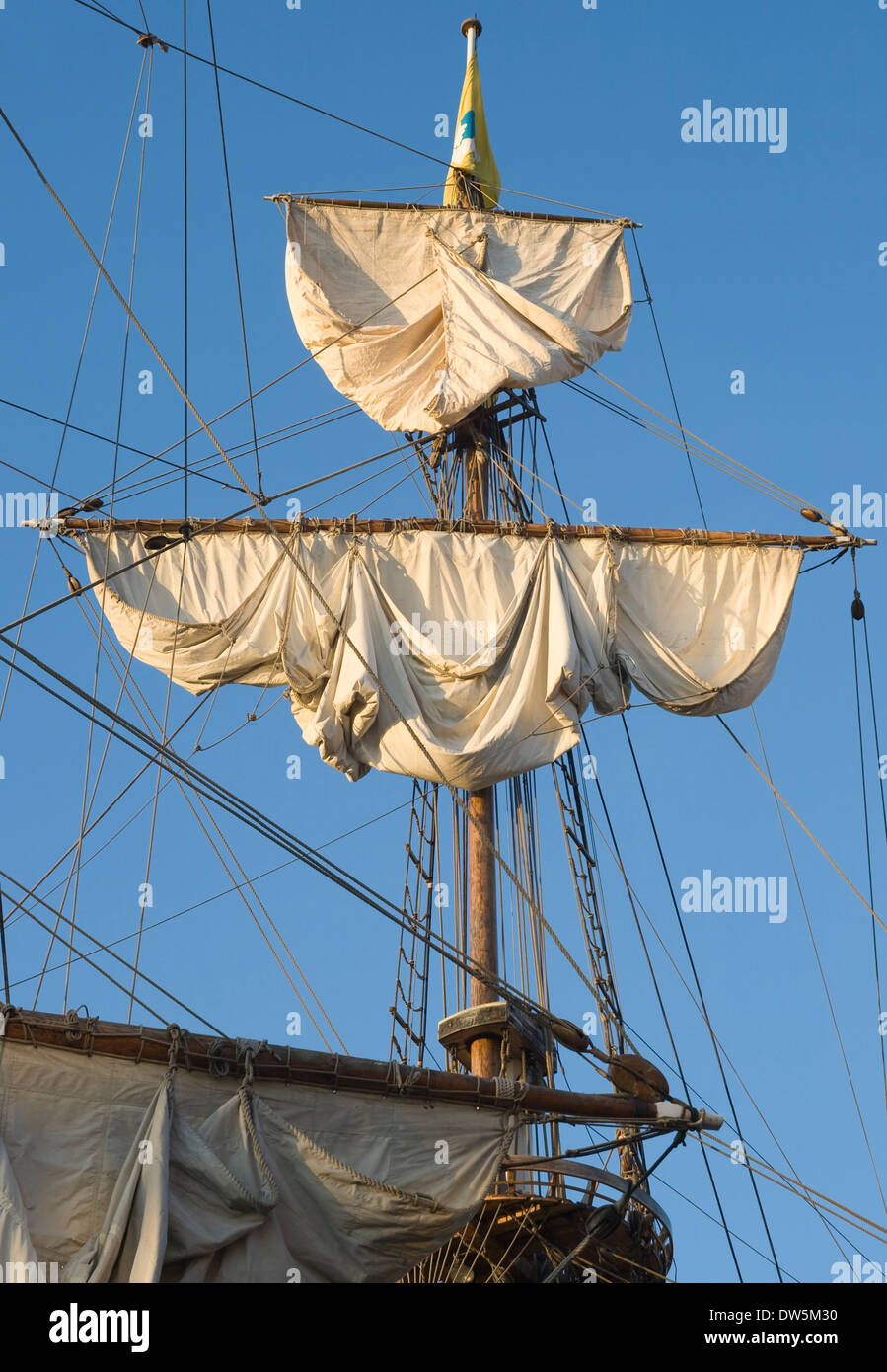 Mast tall ship half hoisted sails hi-res stock photography and images ...