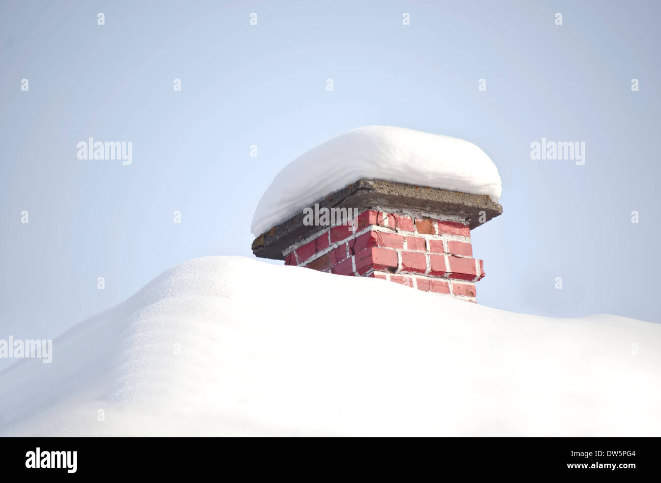 roof and chimney covered with fresh white snow in winter season Stock ...