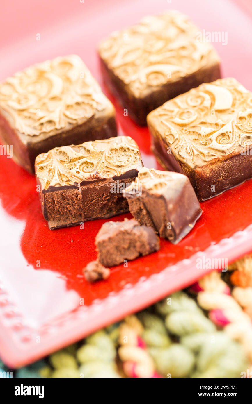 Gourmet Maya spice truffles covered with gold dusting Stock Photo - Alamy