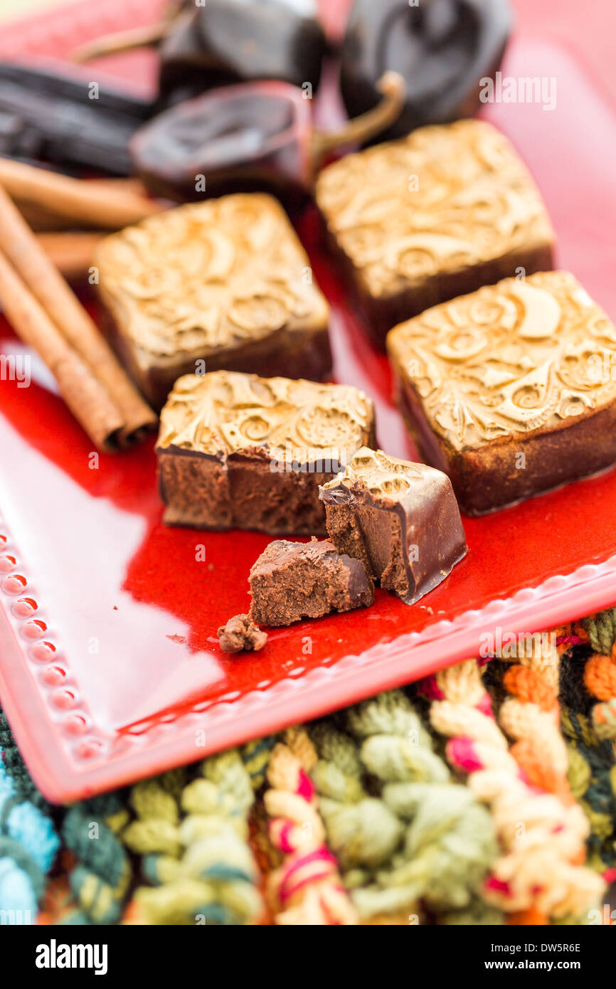 Gourmet Maya spice truffles covered with gold dusting Stock Photo - Alamy