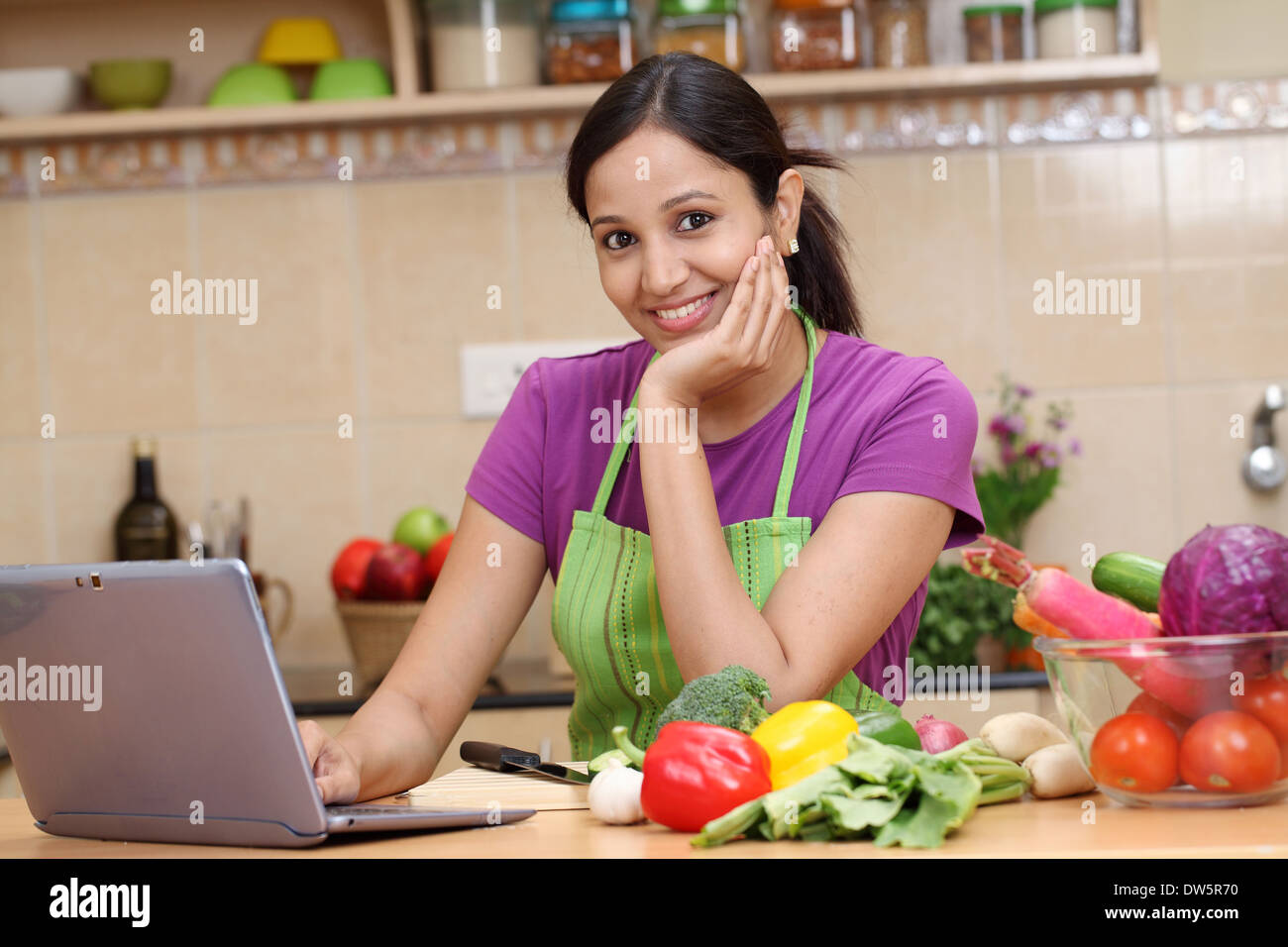 Indian girl using laptop in hi-res stock photography and images - Alamy