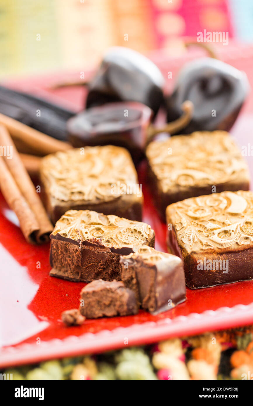 Gourmet Maya spice truffles covered with gold dusting Stock Photo - Alamy