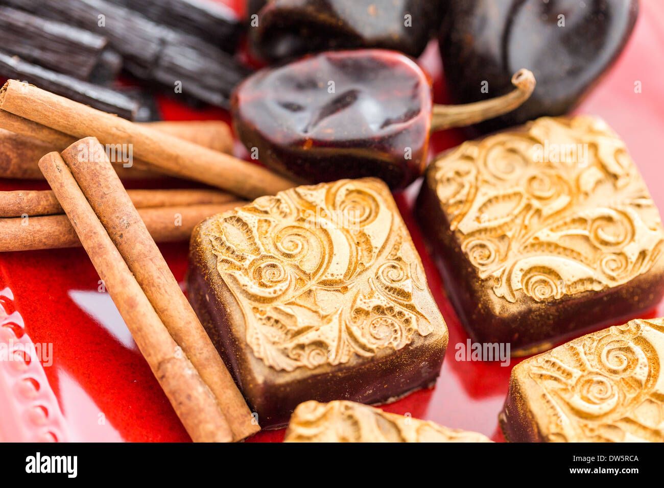 Gourmet Maya spice truffles covered with gold dusting Stock Photo - Alamy