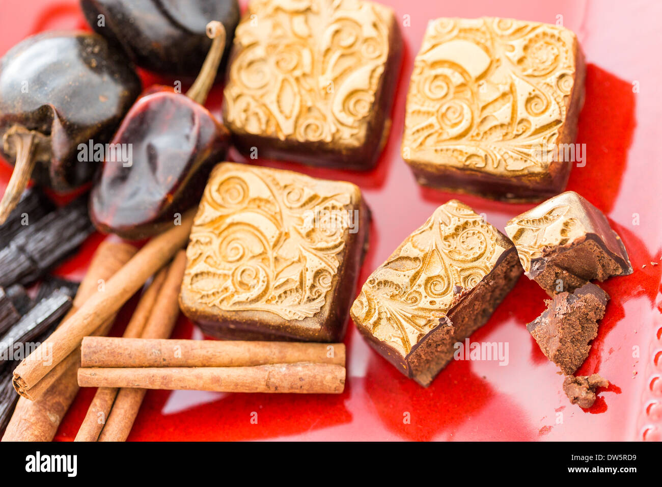Gourmet Maya spice truffles covered with gold dusting Stock Photo - Alamy