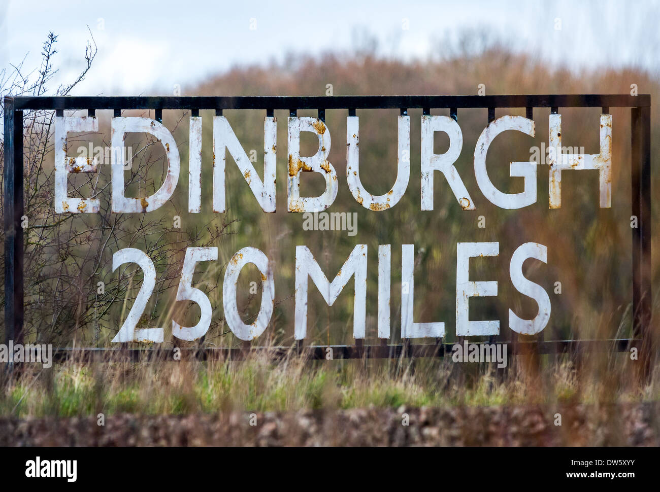 Stamped metal sign Edinburgh 250 miles, east coast main line Stock ...