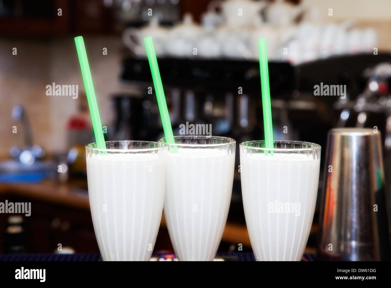 non-alcohol drink milk cocktail with straw on bar Stock Photo - Alamy
