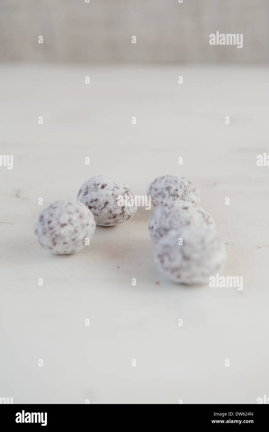 White chocolate candies Stock Photo - Alamy