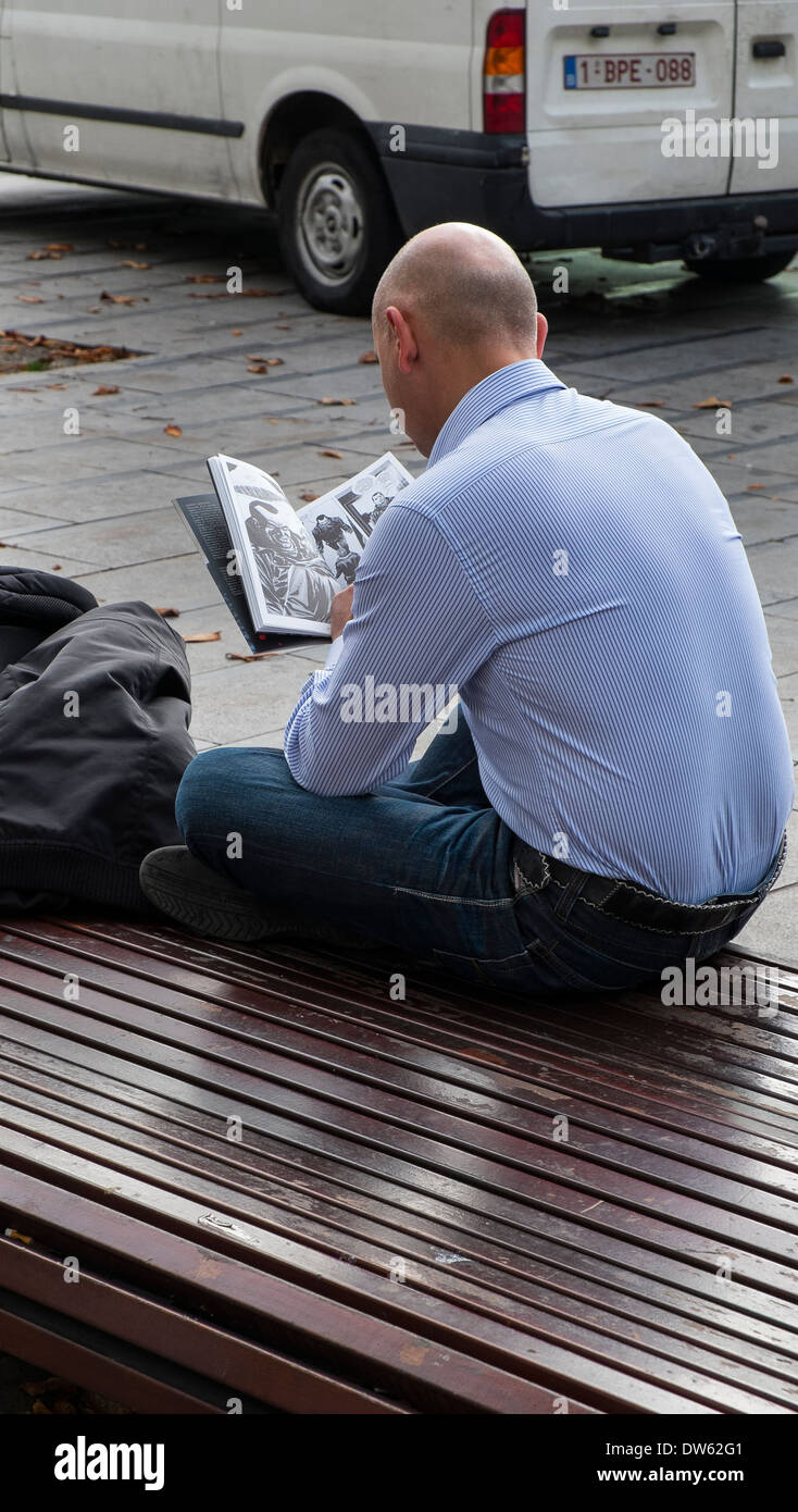 Reading comic hi-res stock photography and images - Alamy