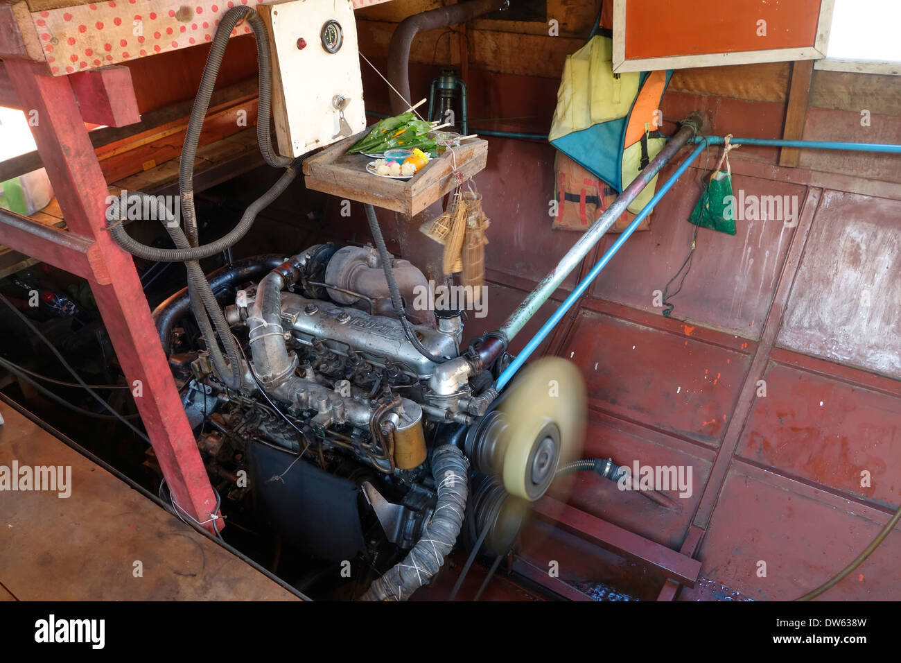 Engine room of a "slow boat" on the Mekong River in Laos Stock Photo ...