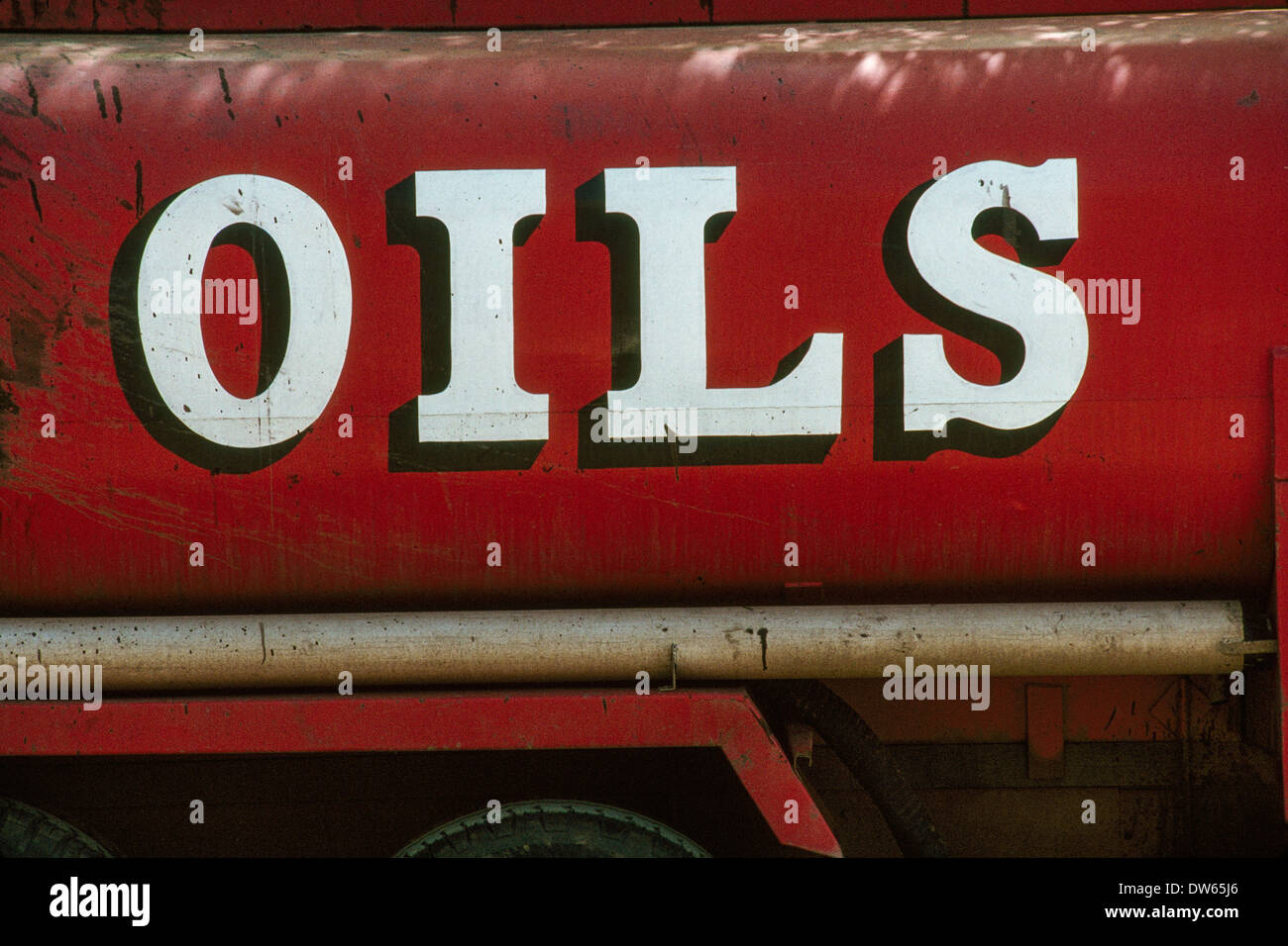 oil truck tanker hand lettered sign graphic red Stock Photo - Alamy