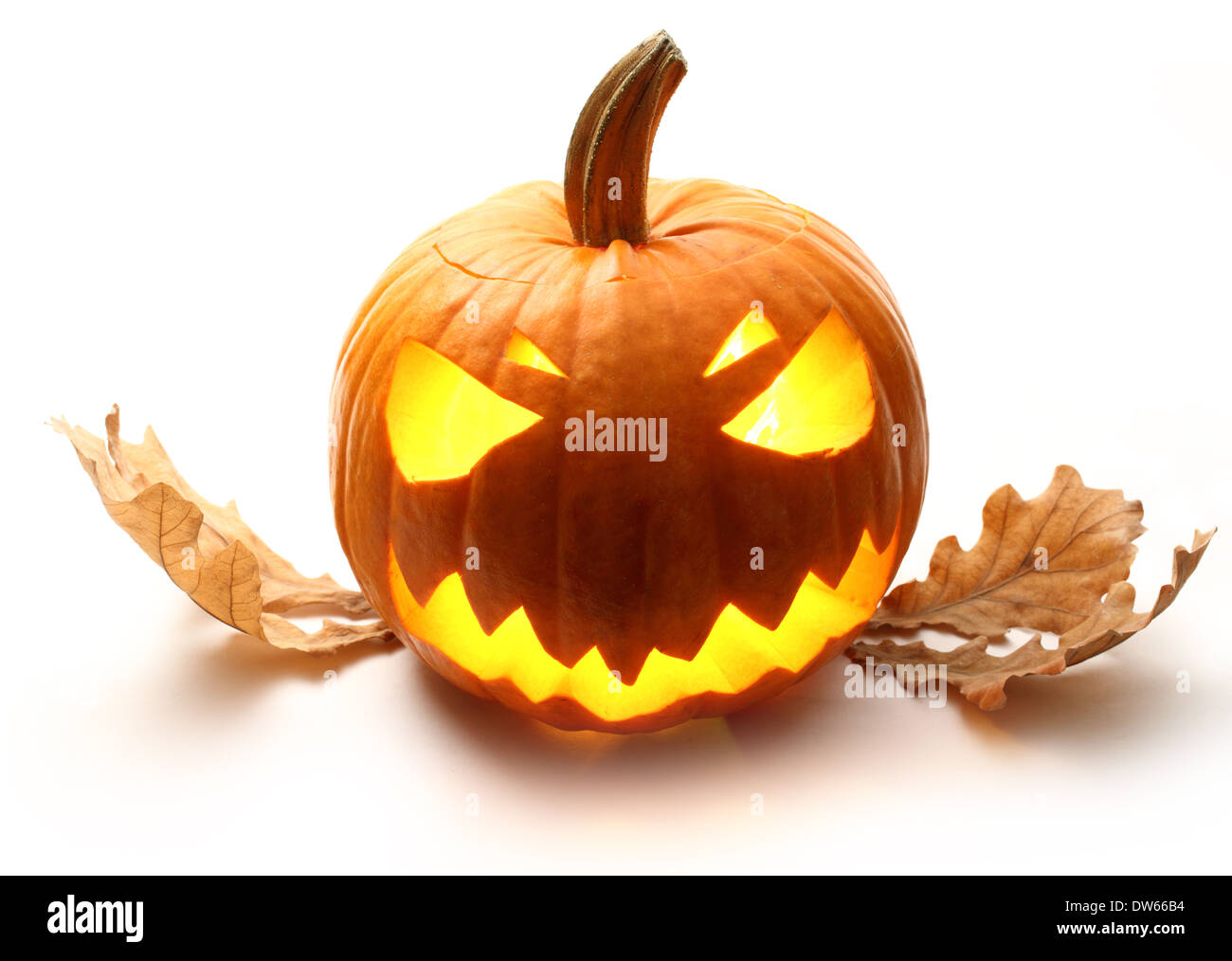 Angry halloween pumpkin with oak leaves Stock Photo - Alamy
