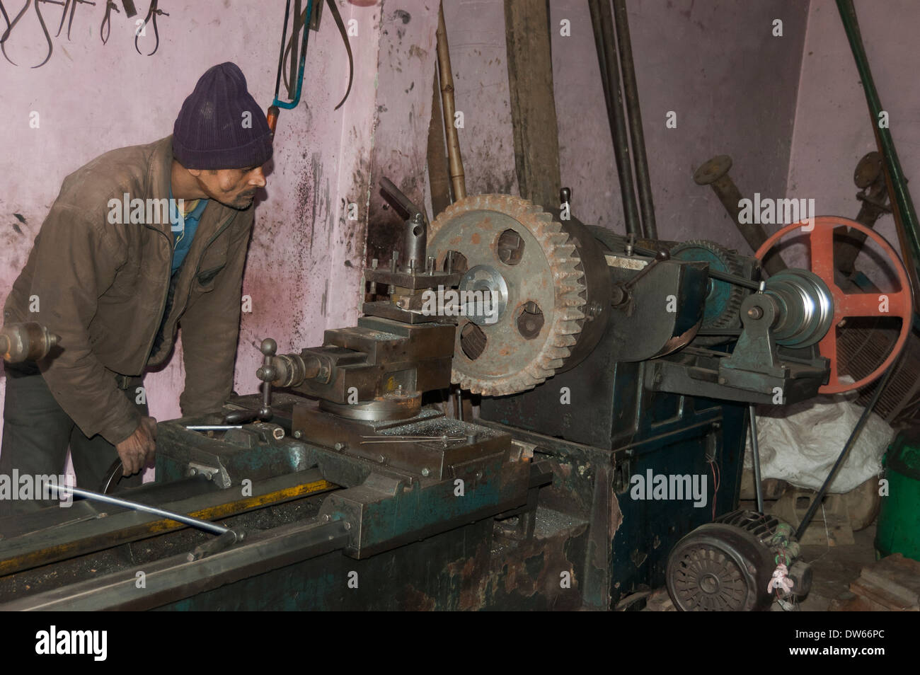 1 Indian man working in factory Stock Photo - Alamy