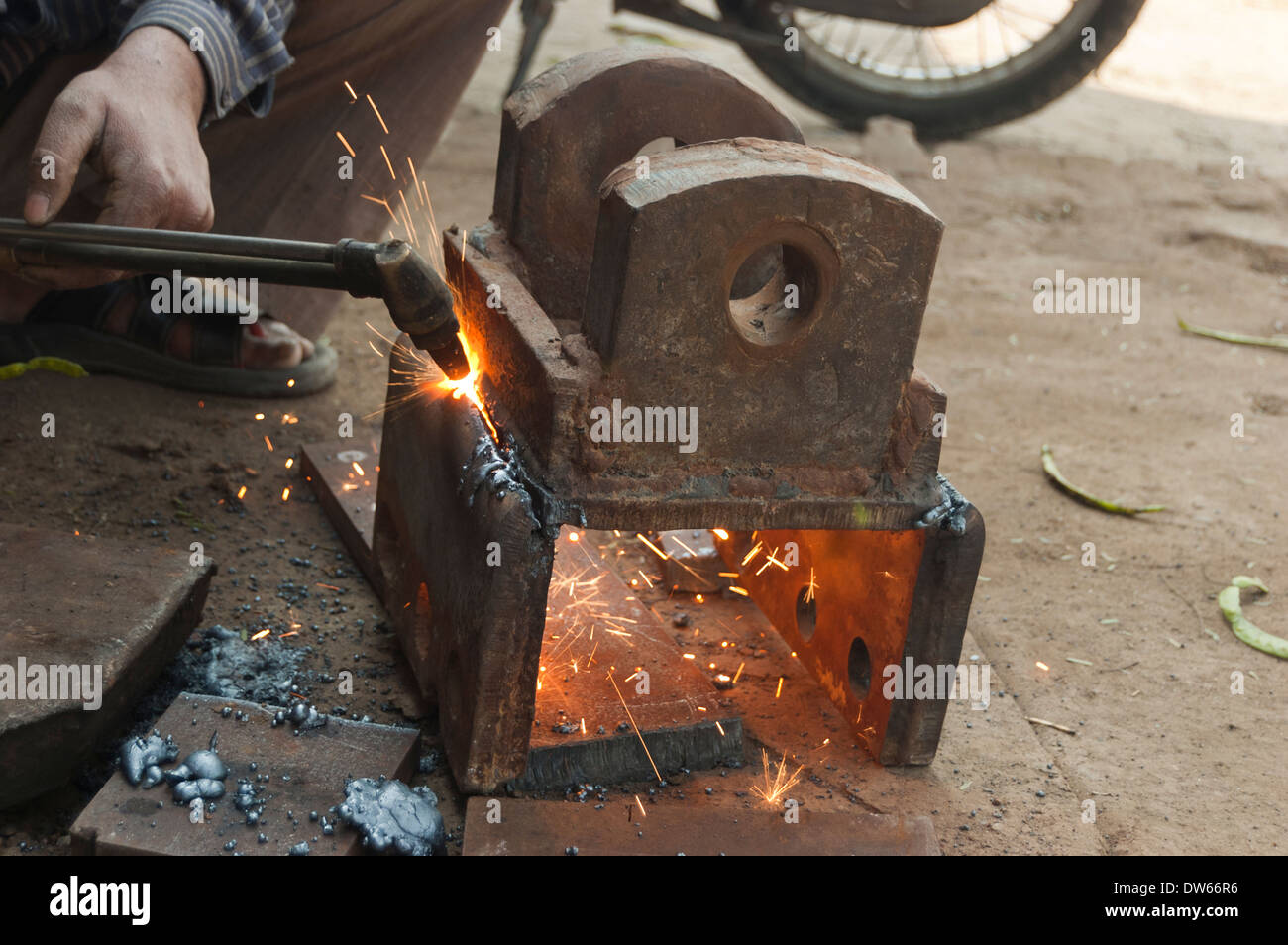1 Indian man working in factory Stock Photo - Alamy