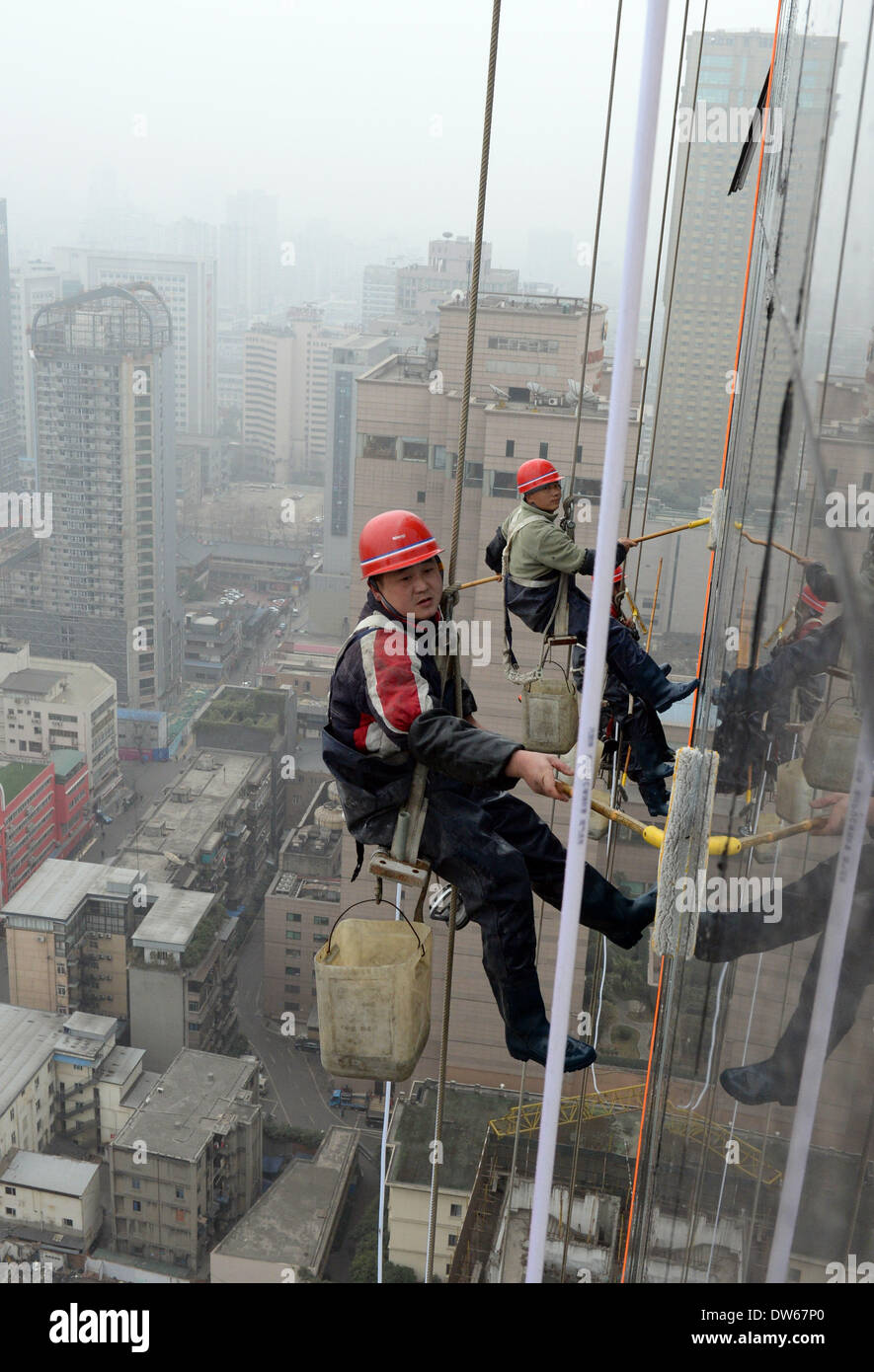 Chengdu, China's Sichuan Province. 28th Feb, 2014. "Spidermen" (window ...