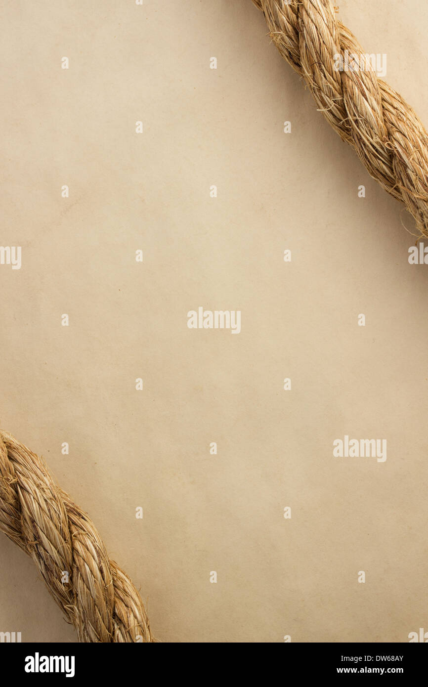 ropes and old vintage ancient paper background Stock Photo - Alamy