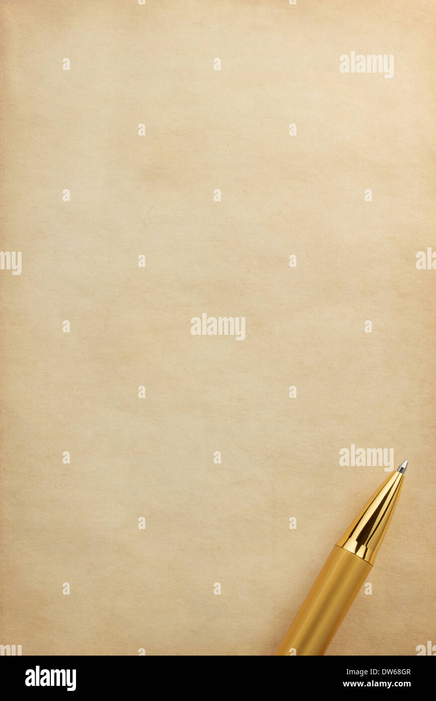 gold pen on parchment background texture Stock Photo - Alamy