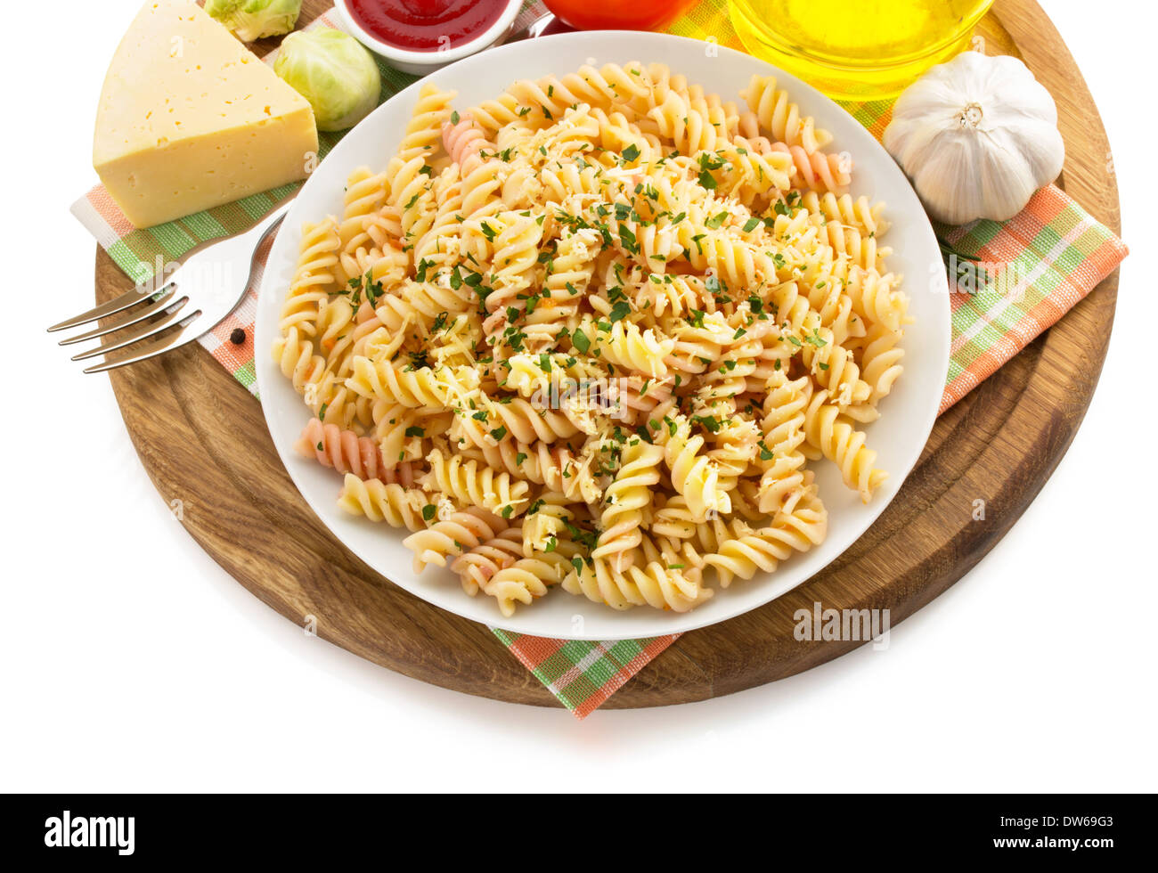 pasta fusilli in plate isolated on white background Stock Photo - Alamy