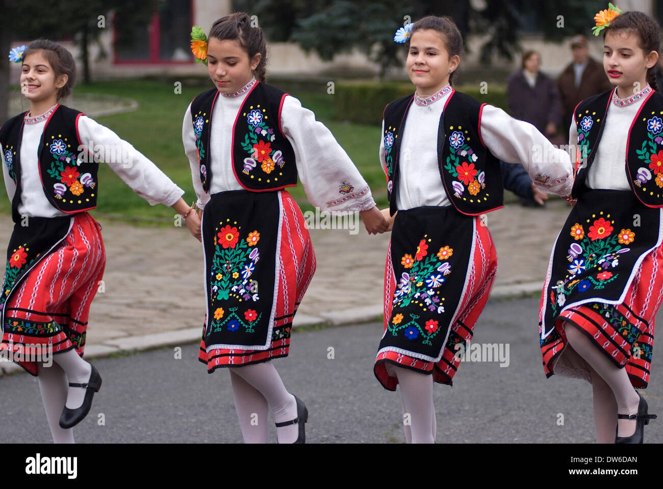 Bulgarian young ladies dress in dress costume celebrating the arrival ...