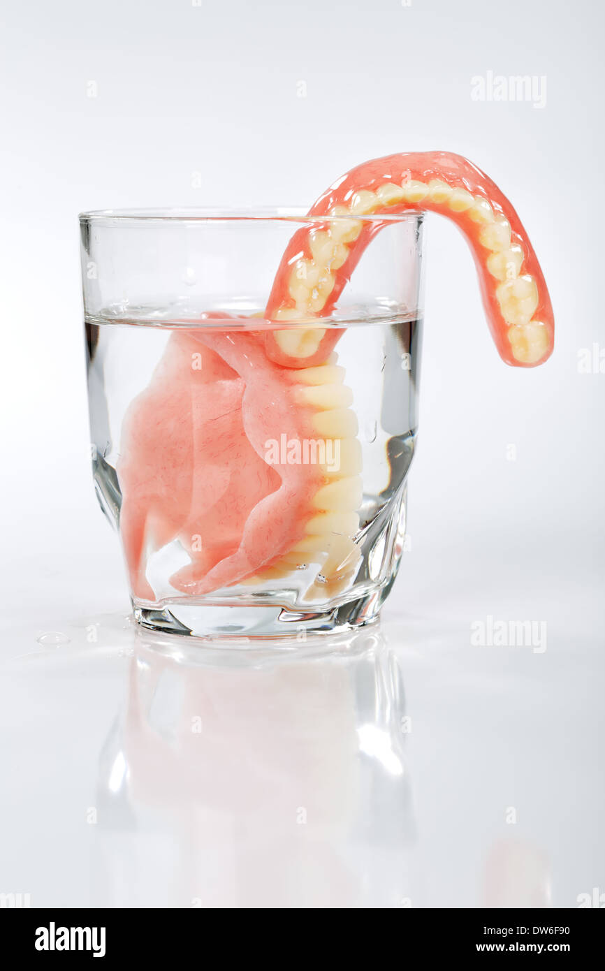 Set dentures in glass water hi-res stock photography and images - Alamy