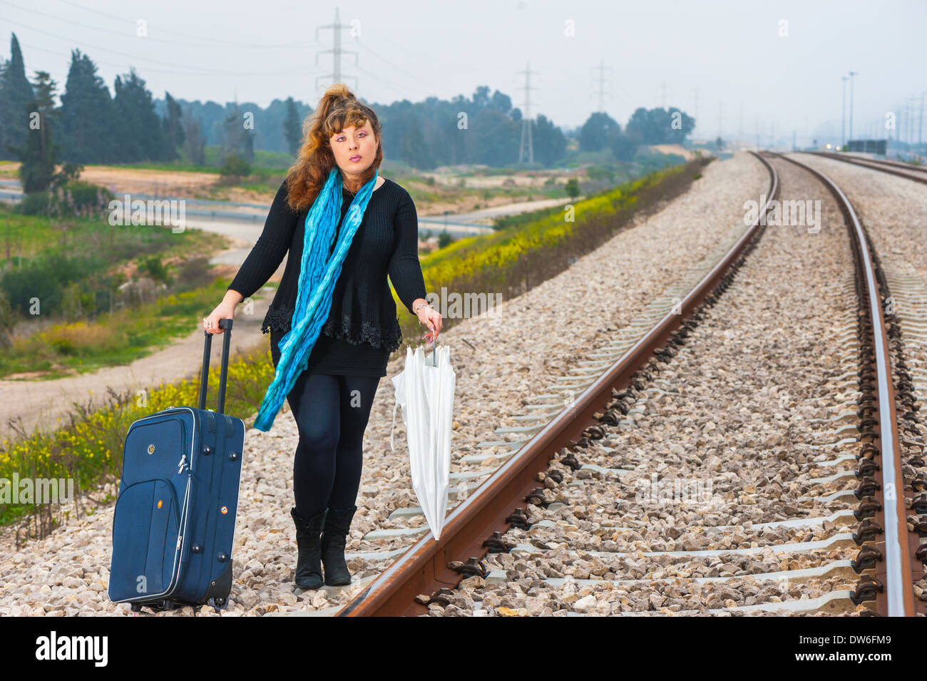Woman leave suitcase hi-res stock photography and images - Alamy