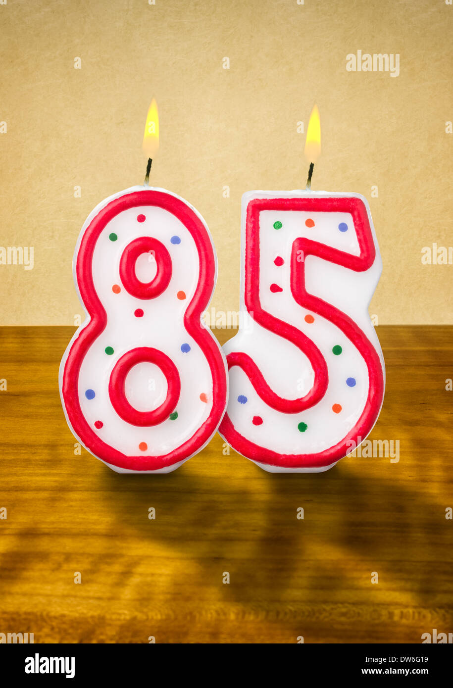 Burning birthday candles number 85 Stock Photo - Alamy