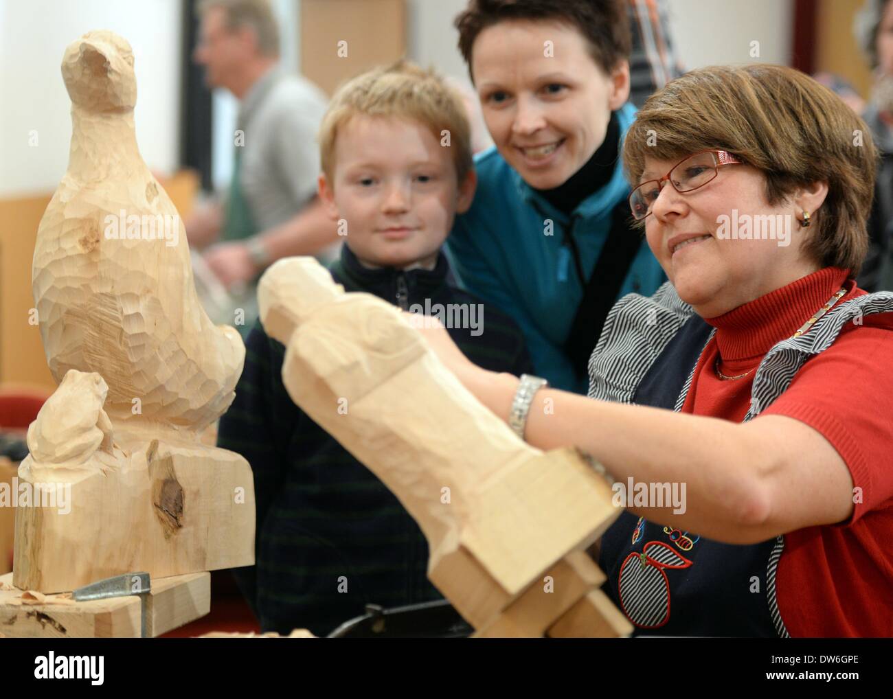 While visitors watch Angela Schreiter (R) from Baerenstein works at a ...