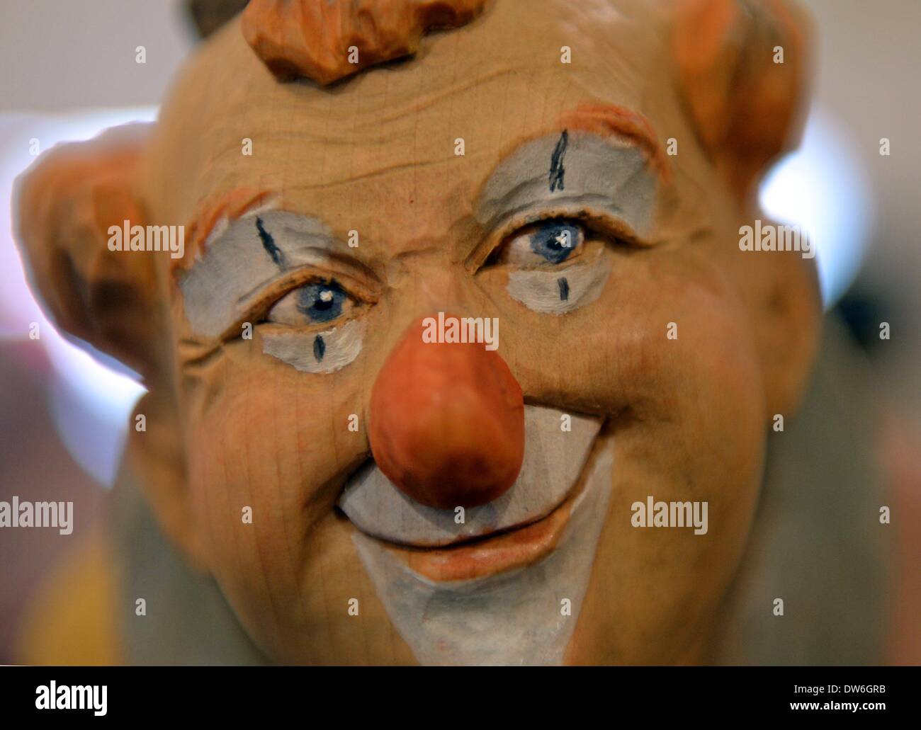The wooden head of a clown laughs into the camera during the 'Erz ...