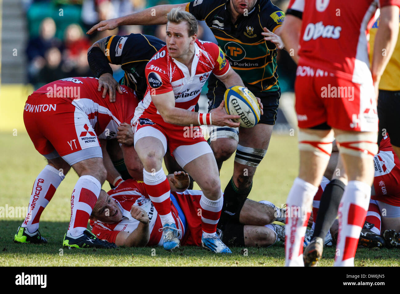 Northampton, England. 1st March, 2014. Dan ROBSON of Gloucester clears ...