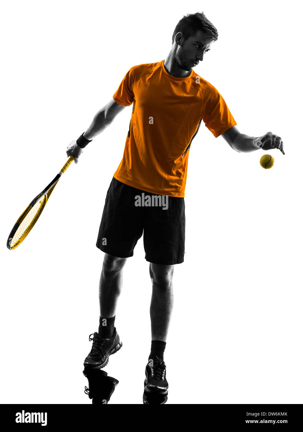 one man tennis player at service serving silhouette in silhouette on ...