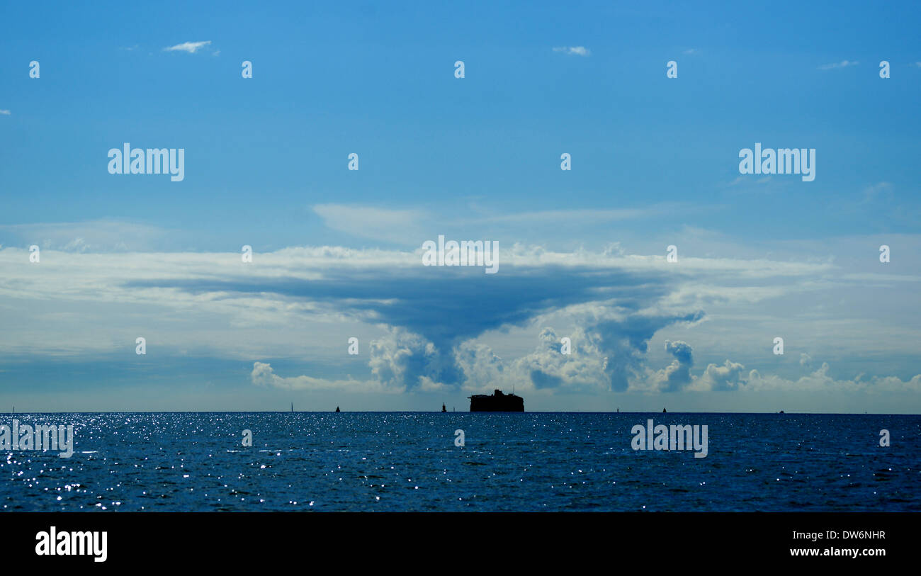 Triangular cloud formations over Solent forts off Isle of Wight ...