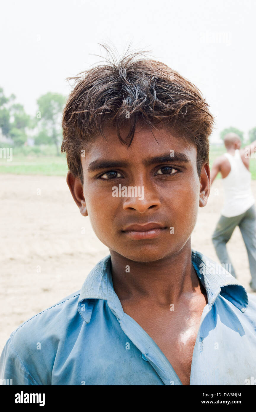 1 Indian boy standing Stock Photo - Alamy