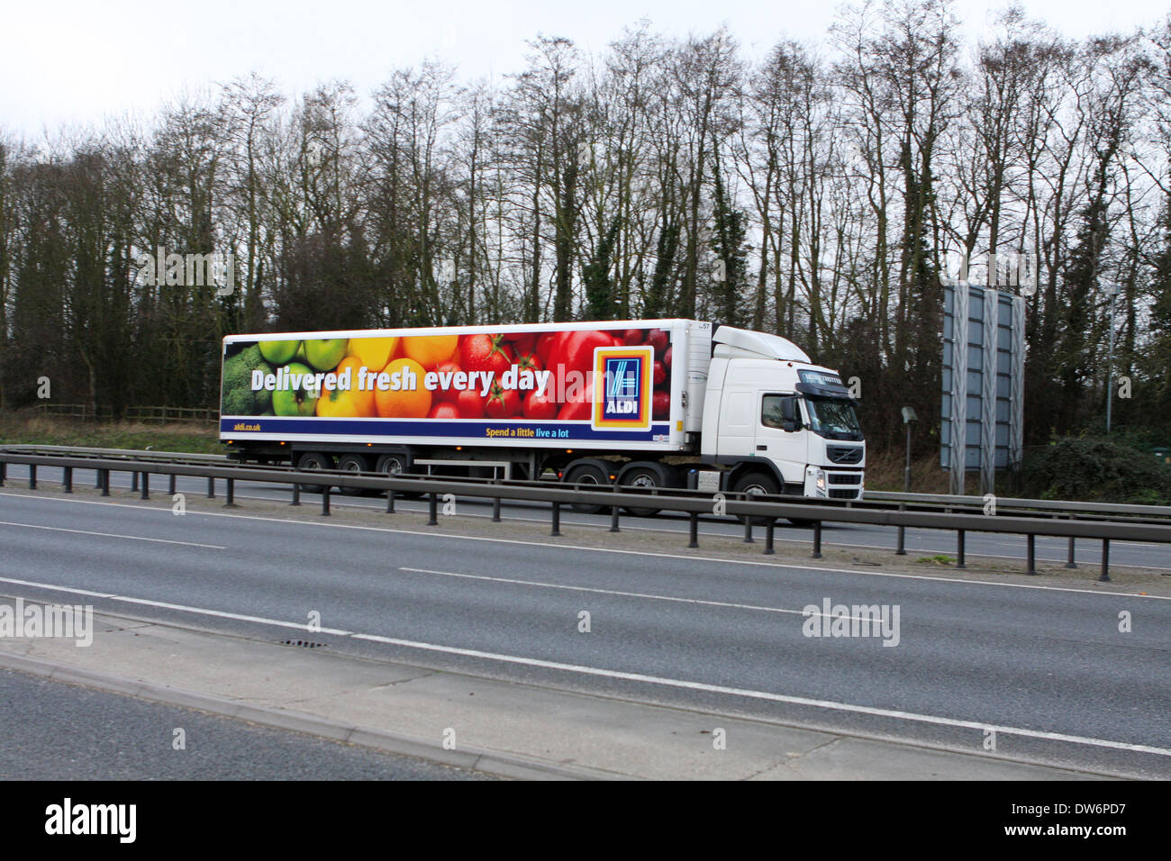 An articulated truck traveling along the A12 road in Essex, England ...