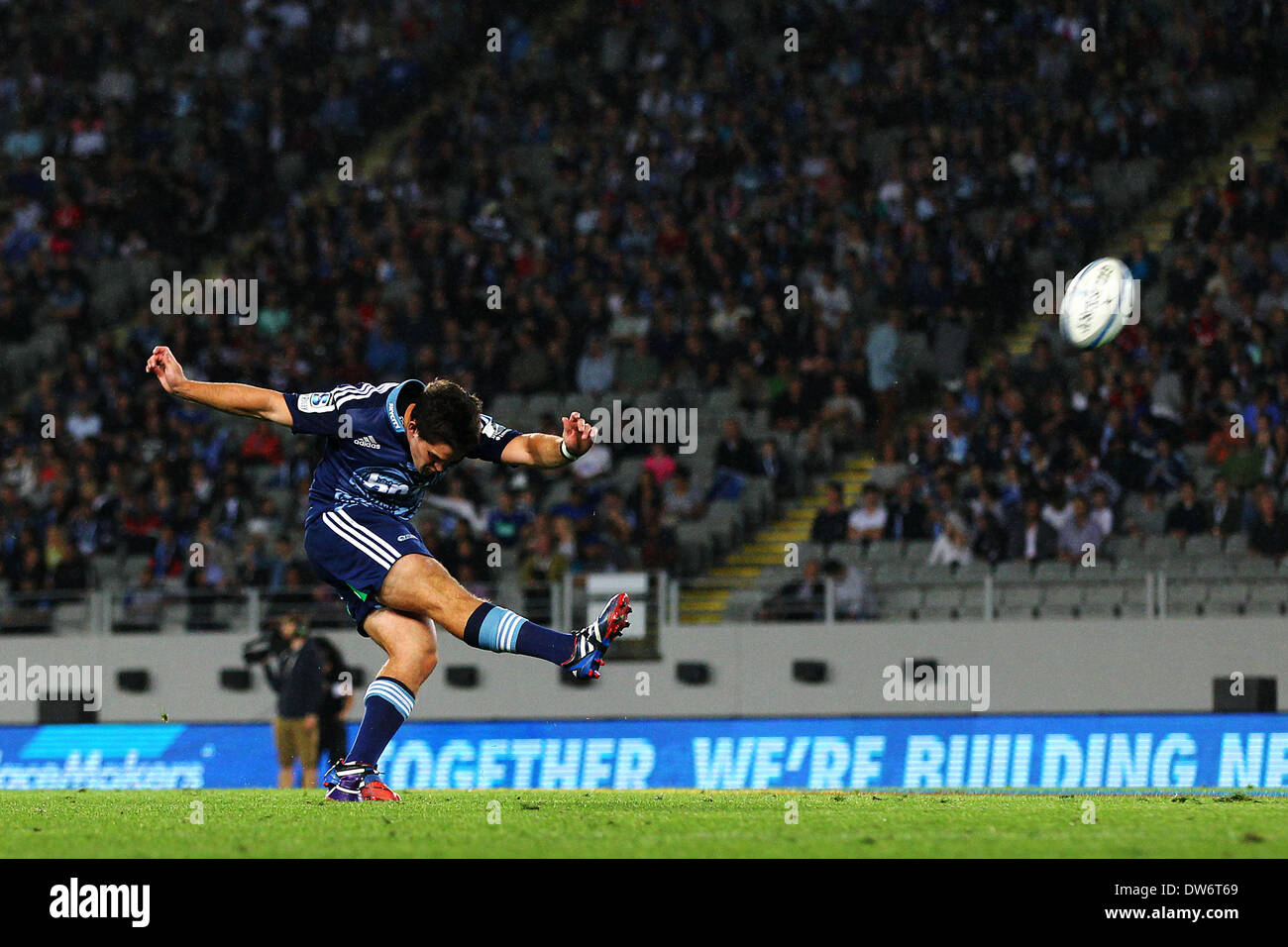 Auckland, New Zealand. 28th Feb, 2014. Simon Hickey of the Blues kicks ...