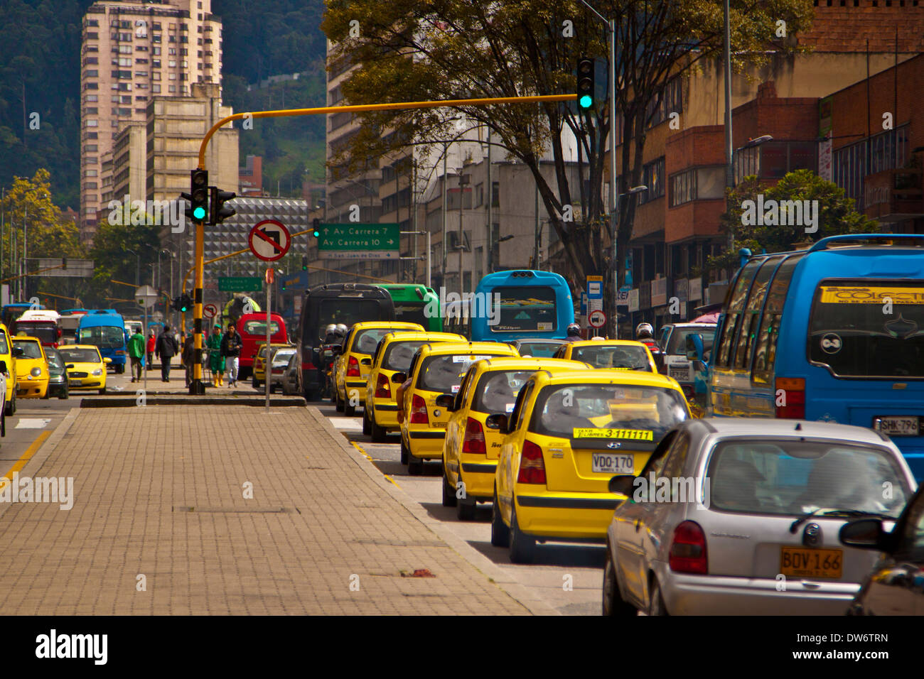 Traffic with taxis Stock Photo - Alamy