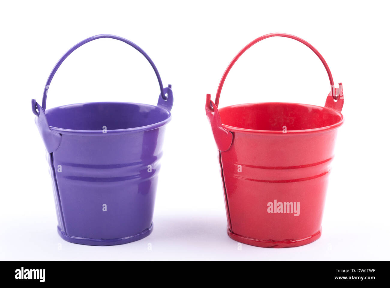 Two iron buckets on white background Stock Photo - Alamy