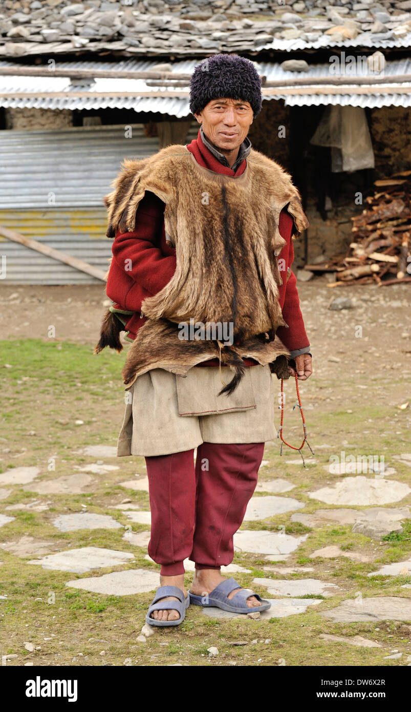 Brokpa man in traditional costume, village of Merak on Merak Sakteng ...