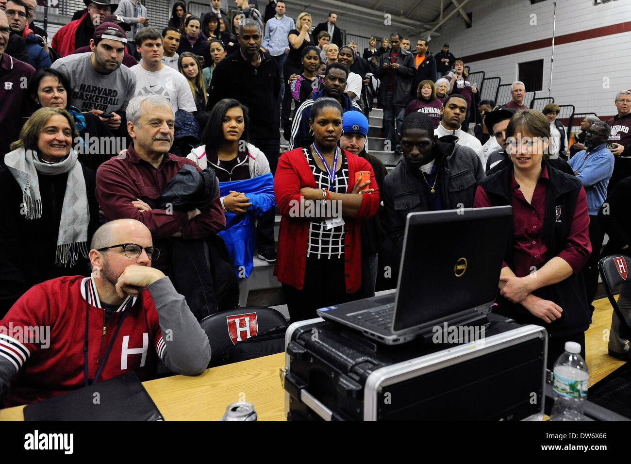 Boston, Massachusetts, USA - March 1, 2014 Harvard fans gather around a ...