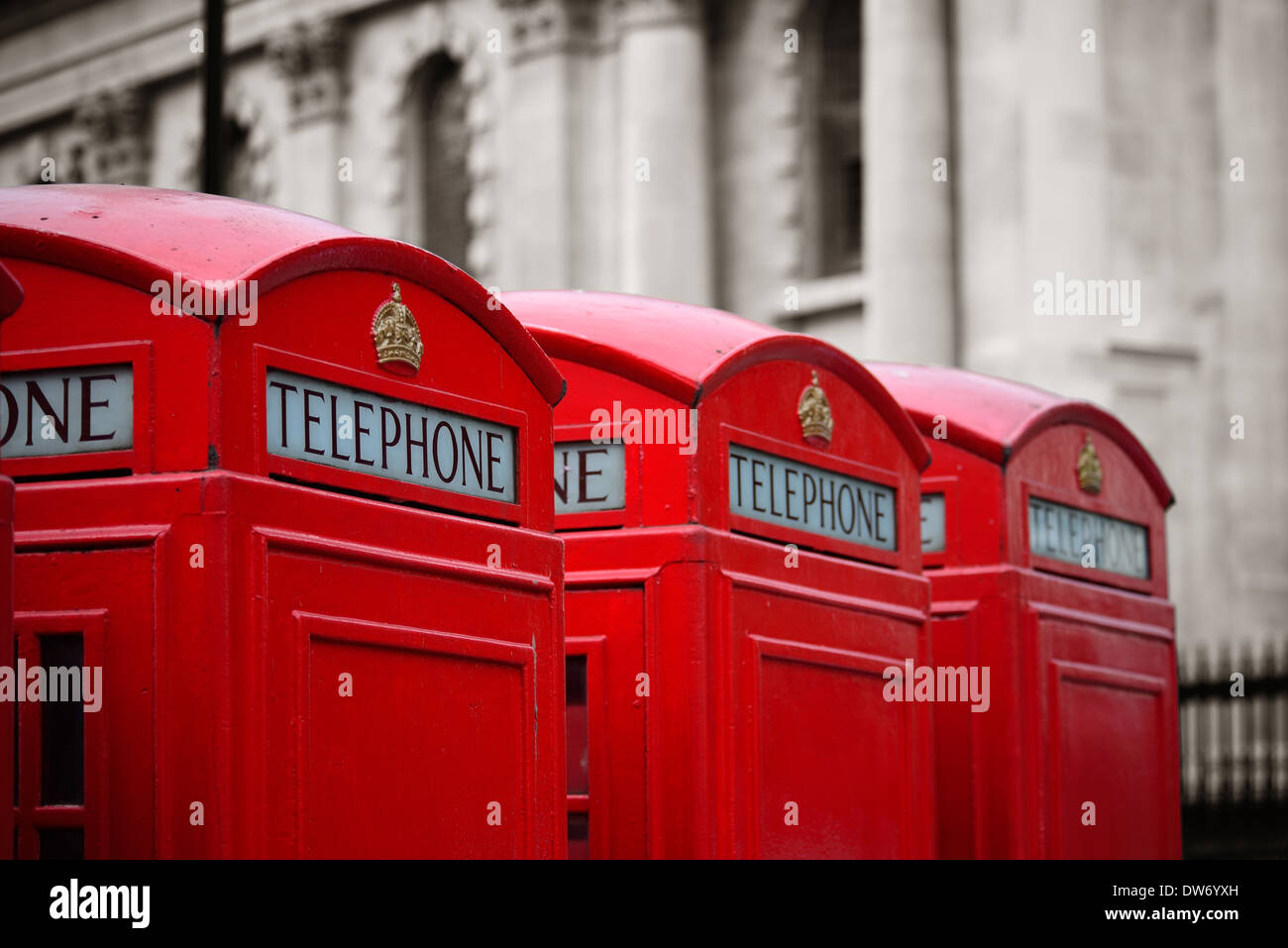 Red telephone box in street with historical architecture in London ...