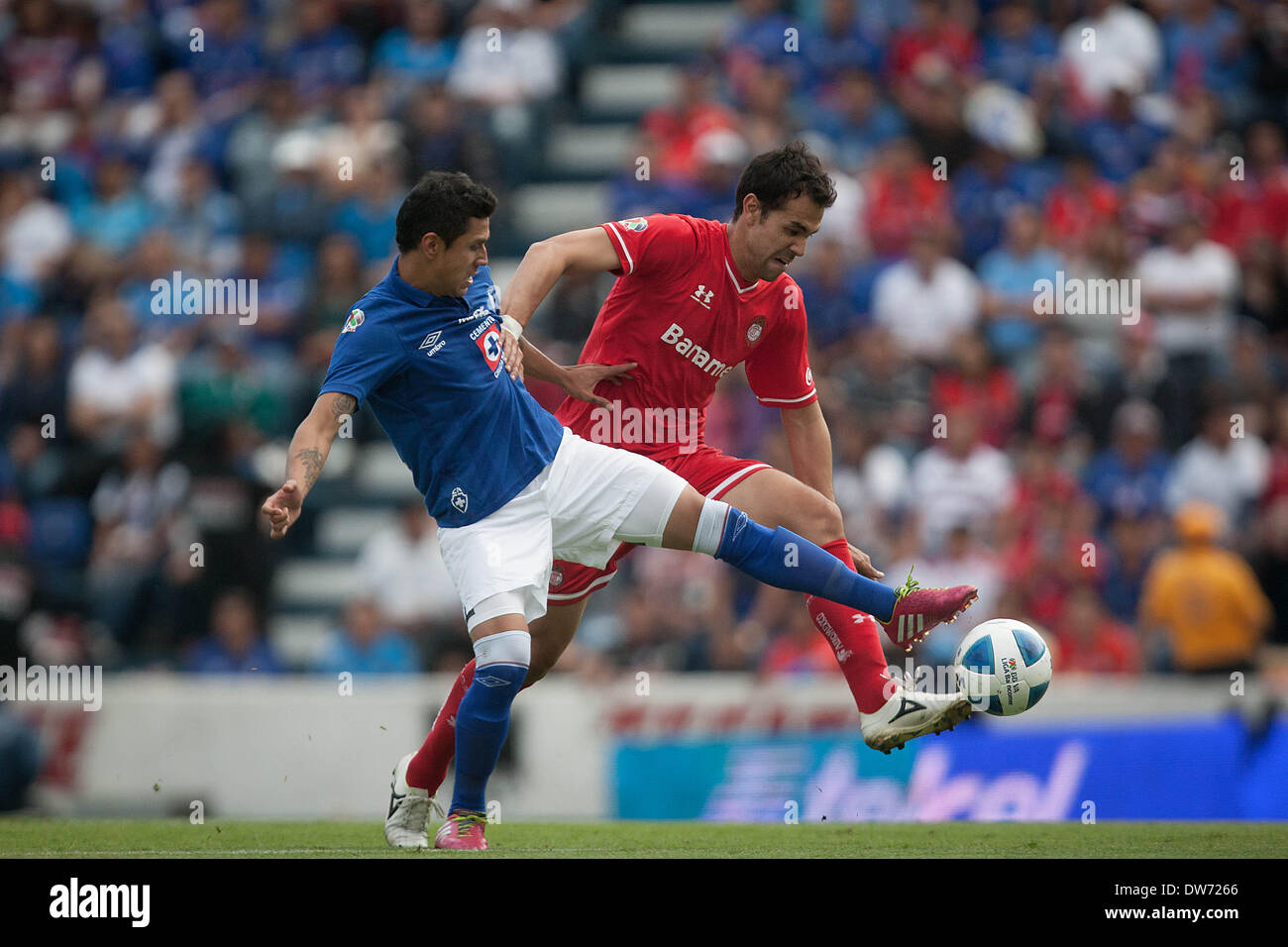 Mexico City, Mexico. 1st Mar, 2014. Julio Cesar Dominguez (L) of Cruz ...