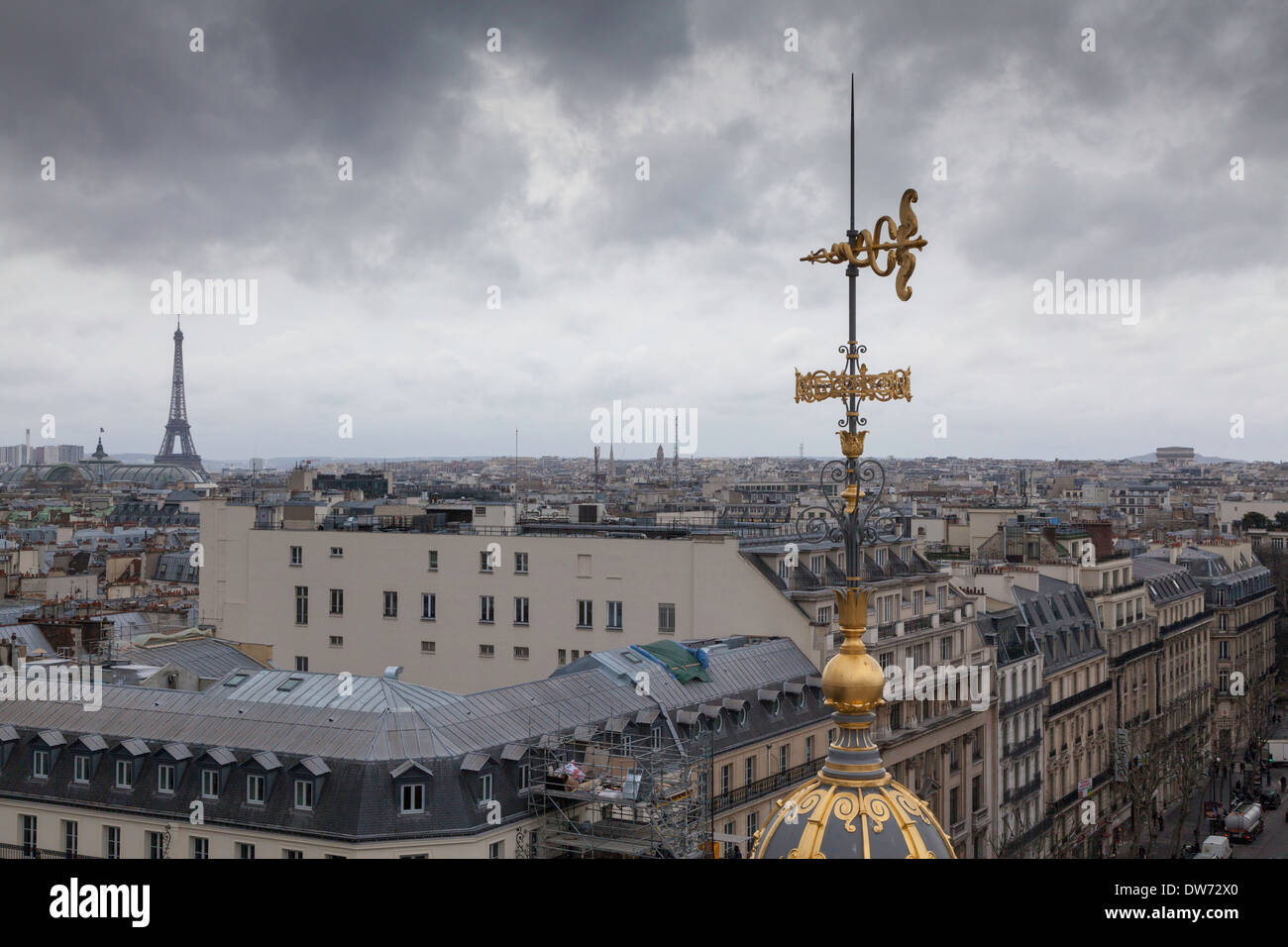 Wind vane pointing towards the Eiffel Tower, Paris, France Stock Photo ...