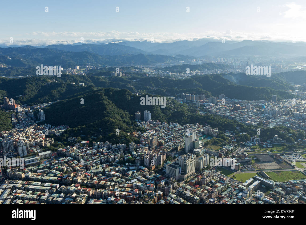 Bird's eye view of city of Taipei, Taiwan between hills in daylight ...