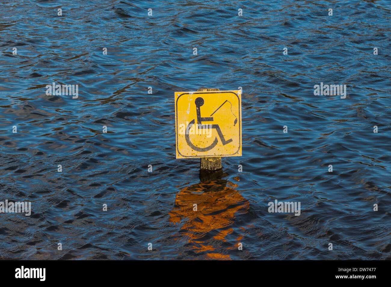 Sign in lake for fishing facilities for disabled people Stock Photo - Alamy