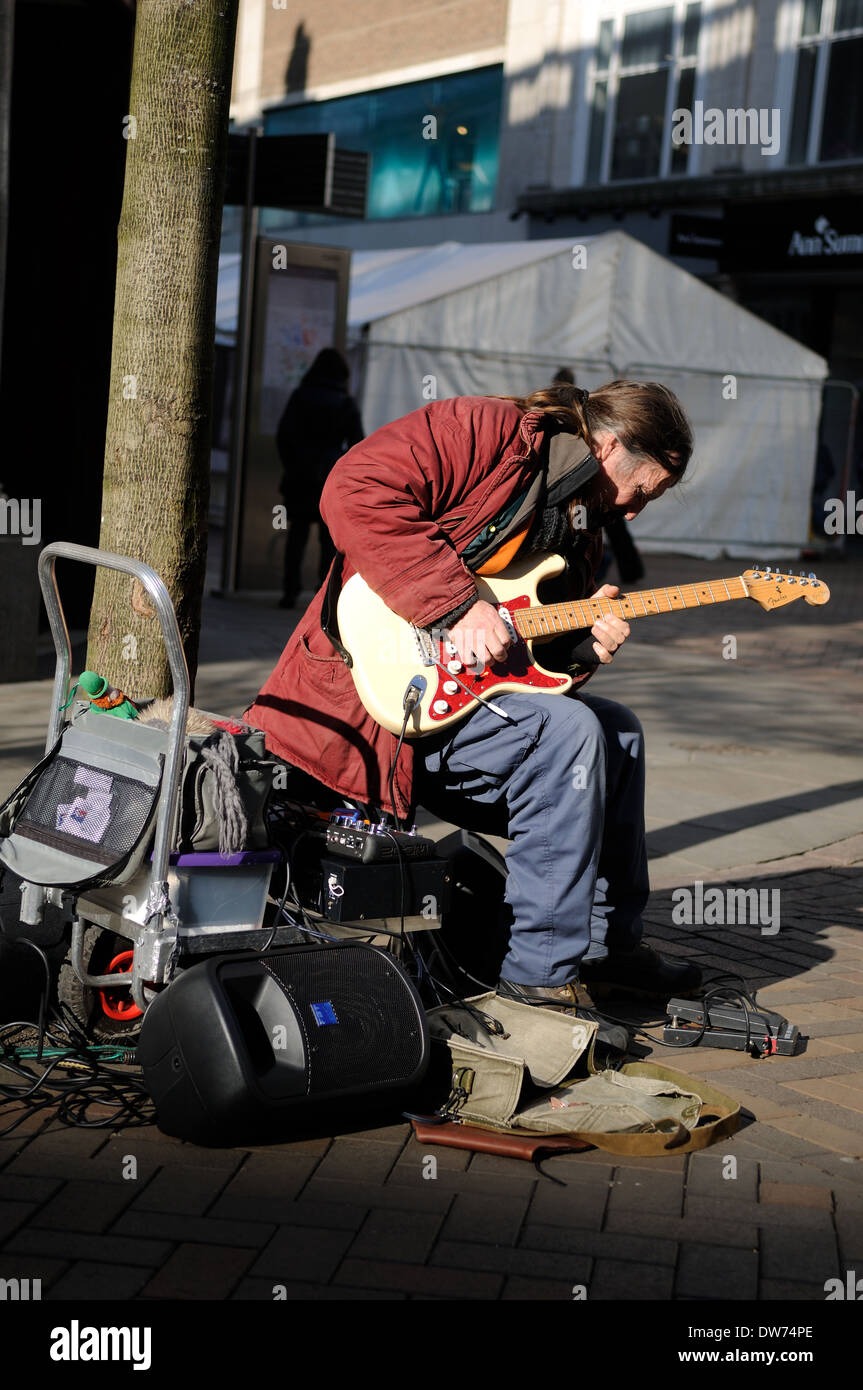 Busker playing electric guitar hi-res stock photography and images - Alamy