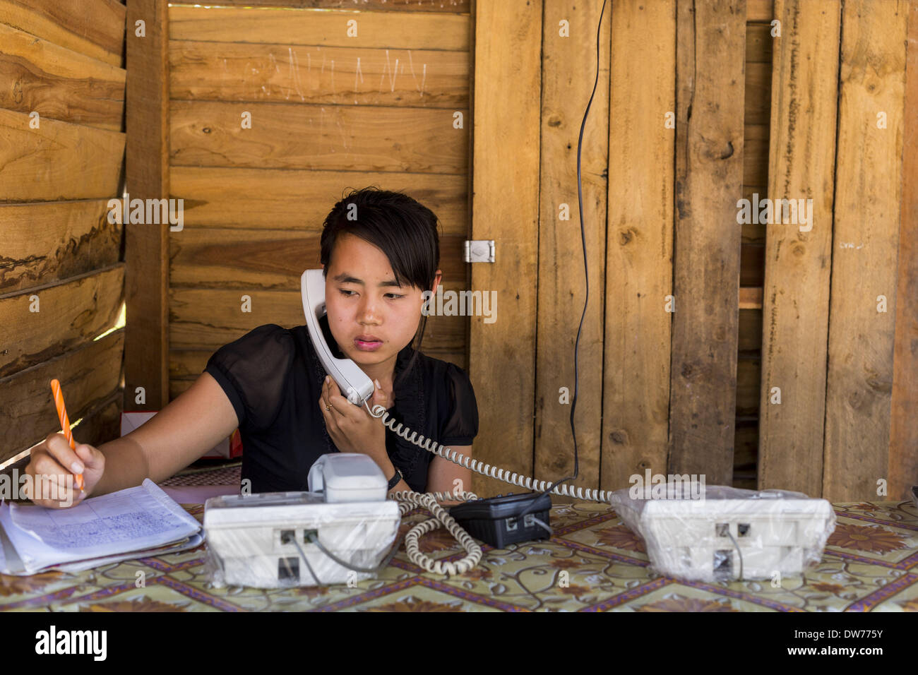 March 2, 2014 - Myawaddy, Kayin, Myanmar - A woman who operates a phone ...
