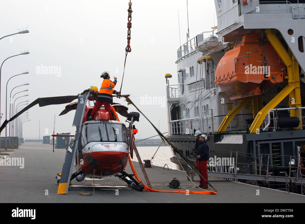 Rostock-Warnemuende, Germany. 2nd March 2014. Crew members of the ...
